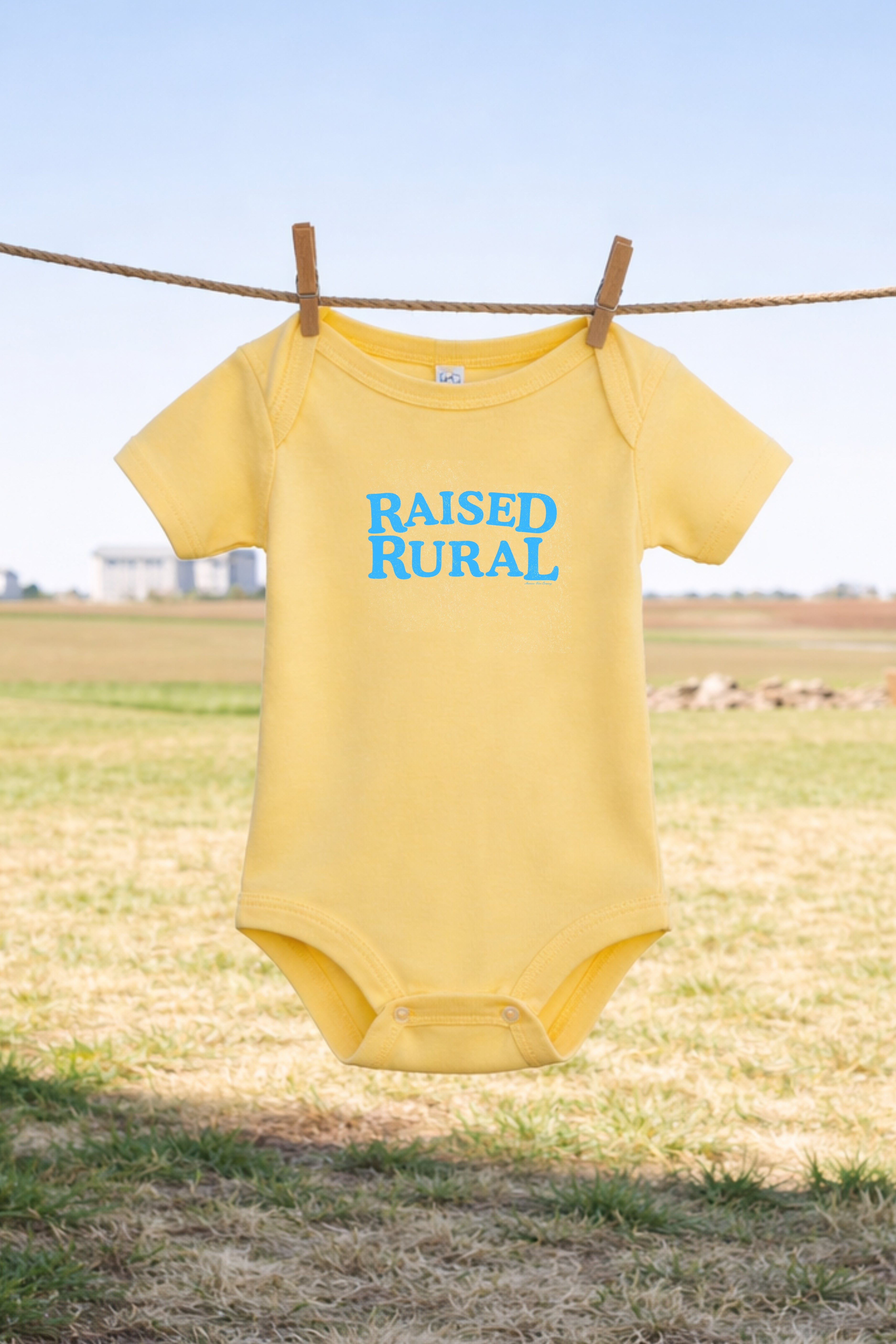 Raised Rural' Yellow Onesie – American Farm Company